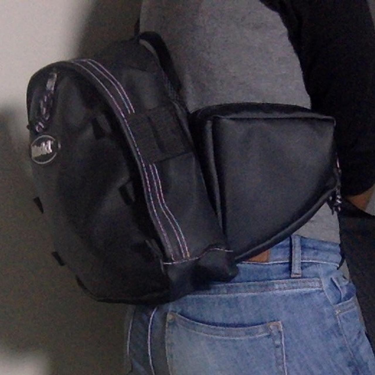 SOLD cool backpack strapless and secures around the... - Depop