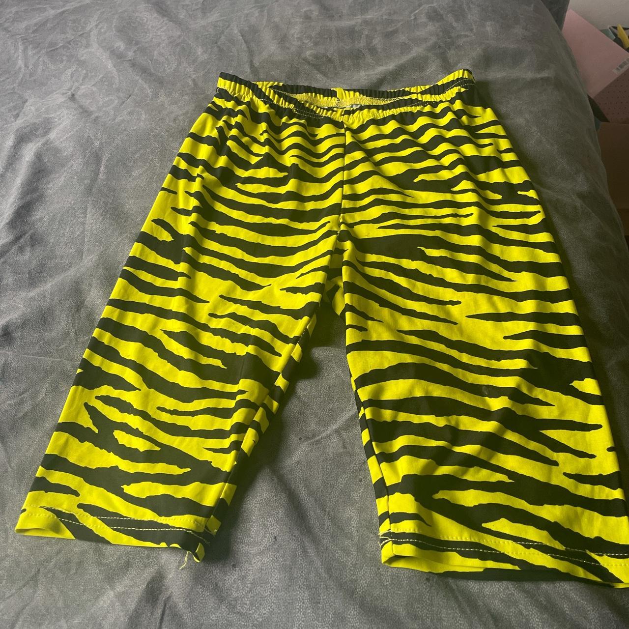 rave yellow zebra shorts, perfect for raves/... - Depop