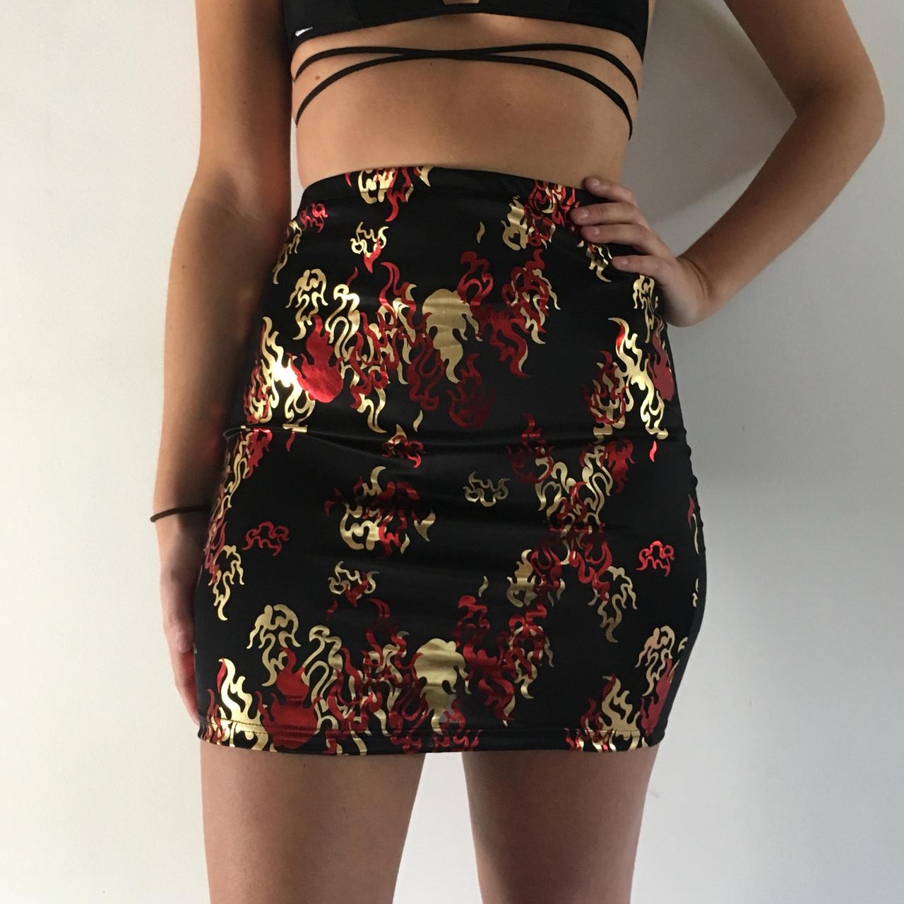 that’s so... FIRE skirt 🔥🖤🔥 Skirt has a thick black... - Depop