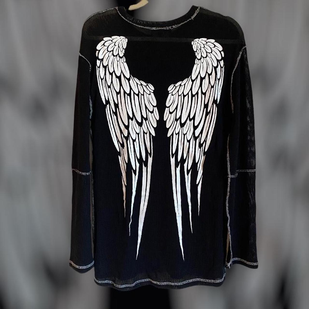 Super sick black knit top with wing graphics on the... - Depop