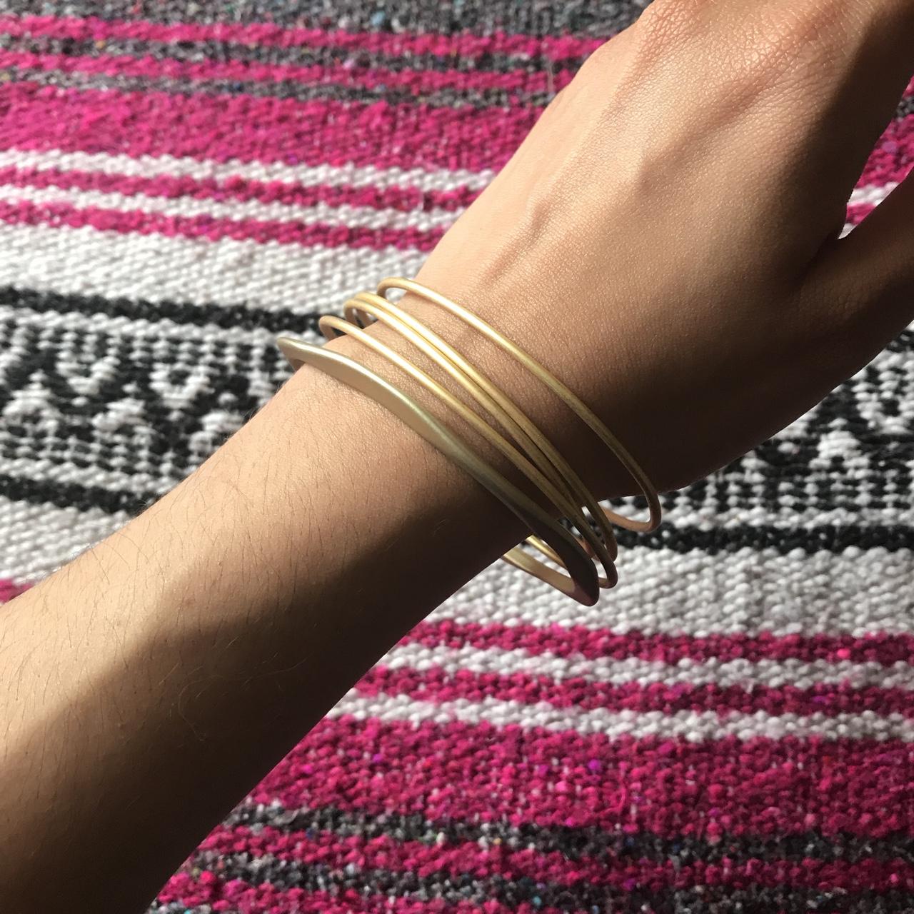 5 stackable gold bracelets. They are a little big... - Depop