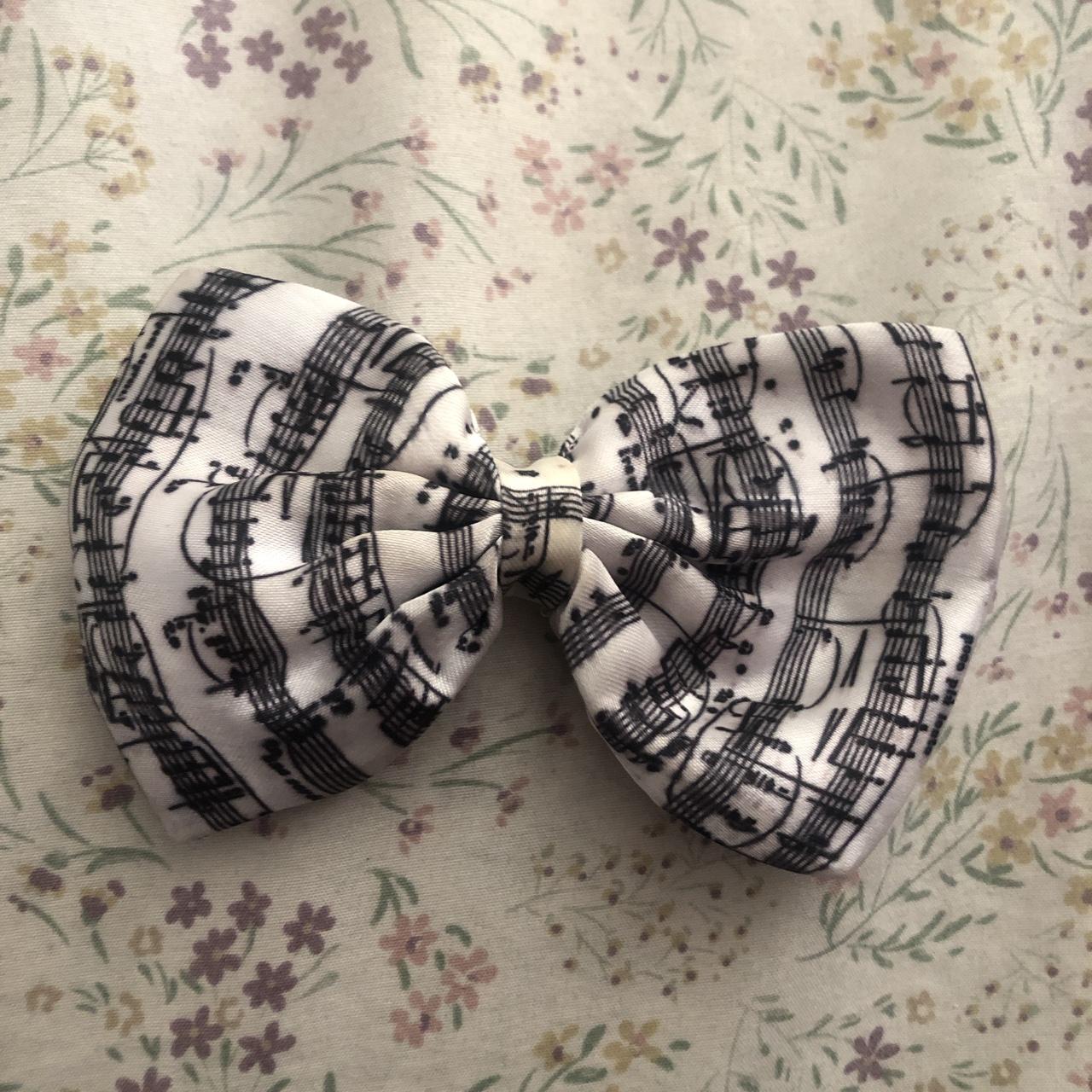 music note bow | Depop
