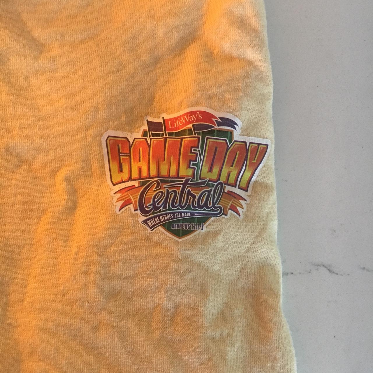 The cutest pale yellow color. Game Day logo on the... - Depop