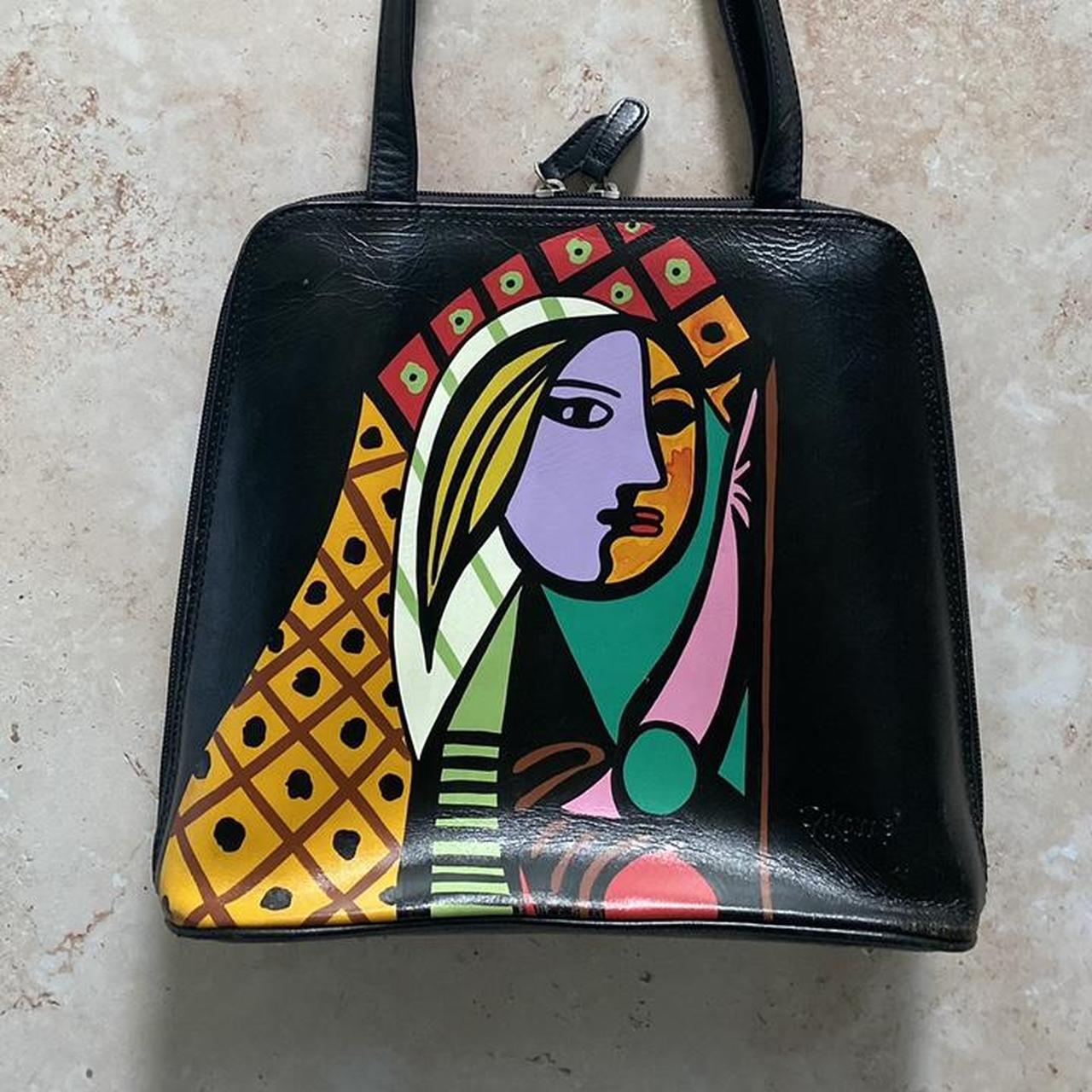 Unique graphics handbag, worn a few times but in... - Depop