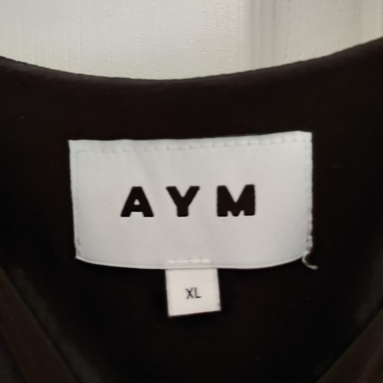 AYM Studio bodycon mini dress with scoop neck and... - Depop