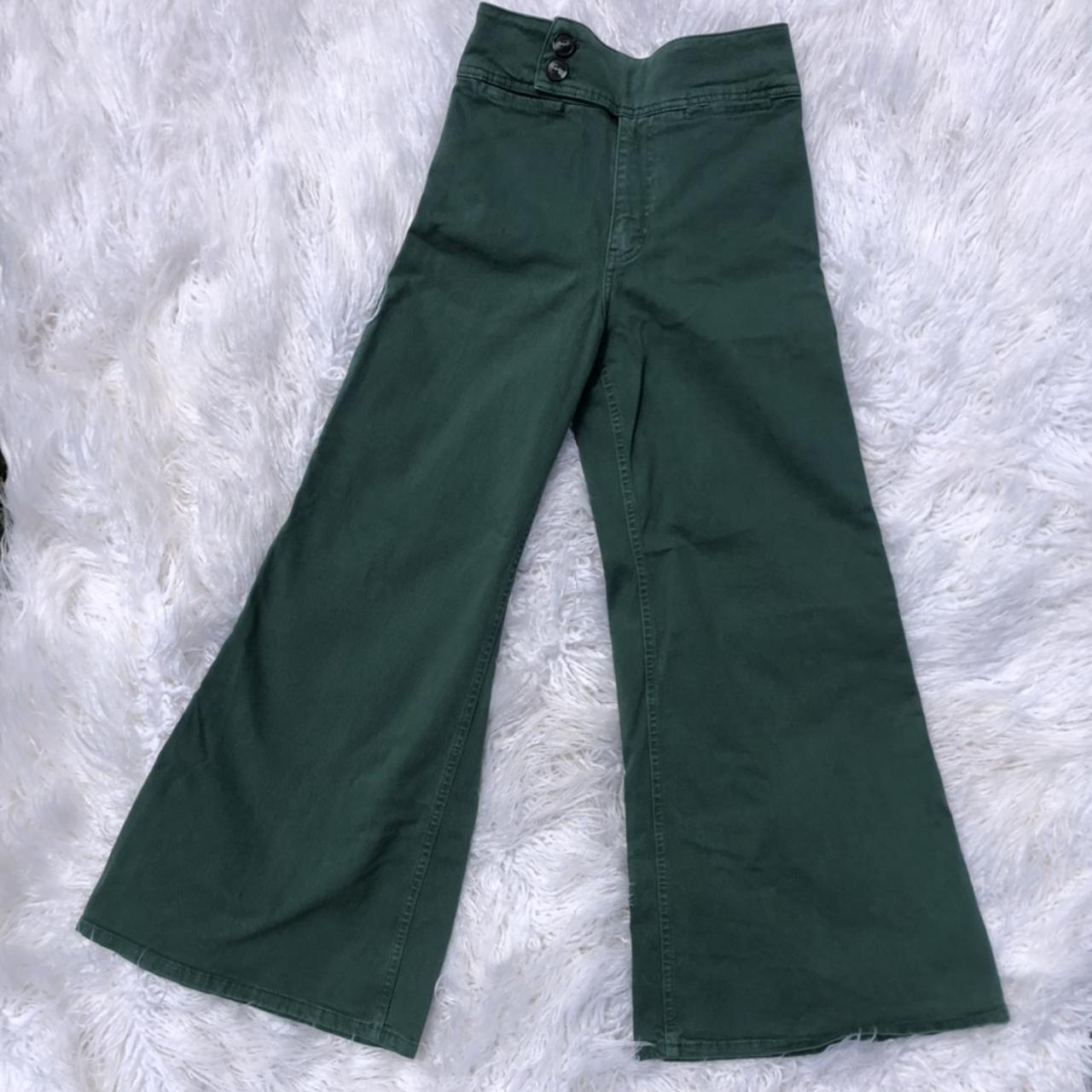 big flare dark green jeans by we the free, double... - Depop