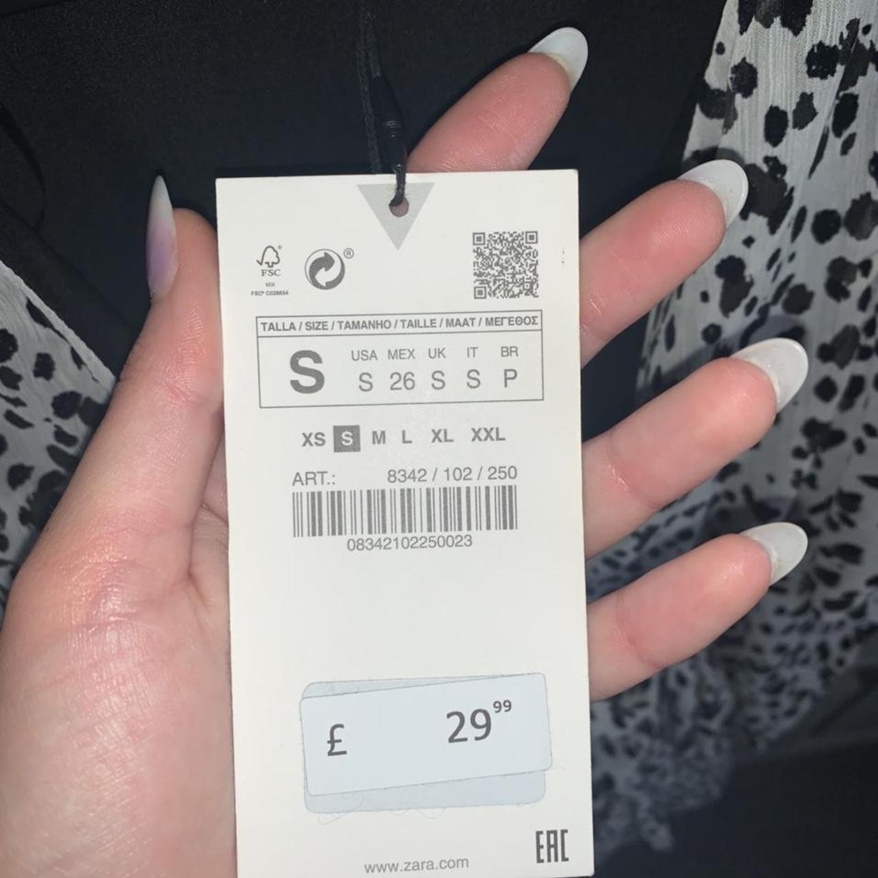 Black and white printed wrap dress size small from... - Depop