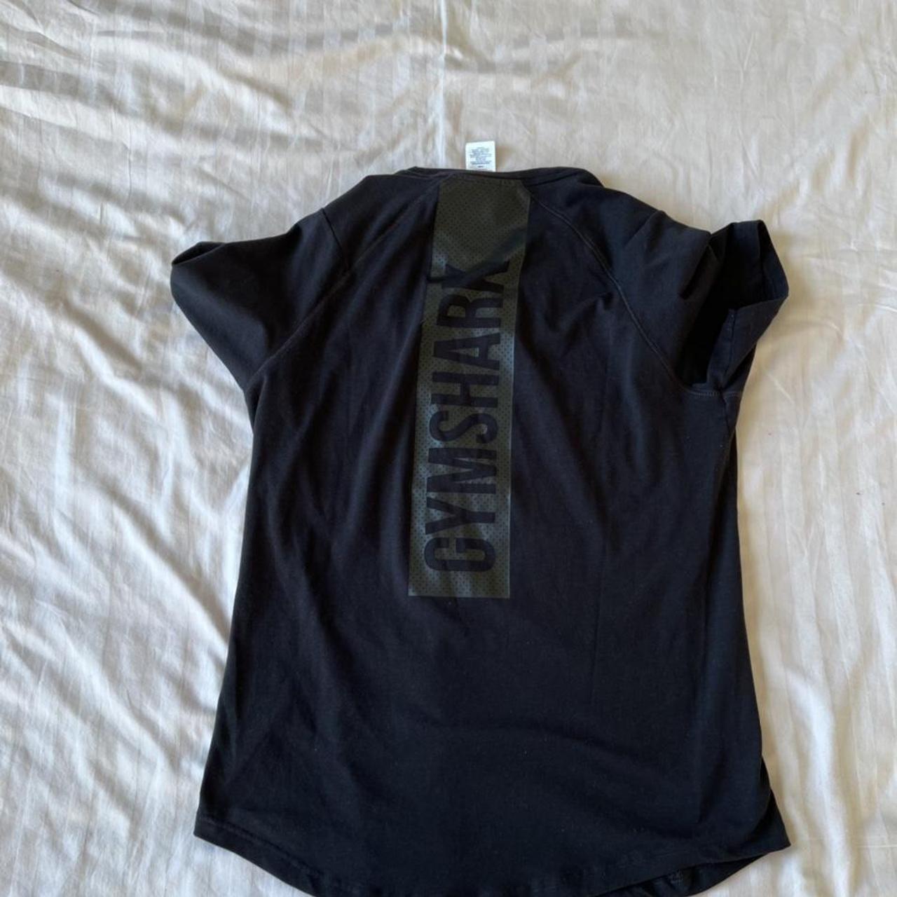 Black gymshark tee shirt size medium - Depop
