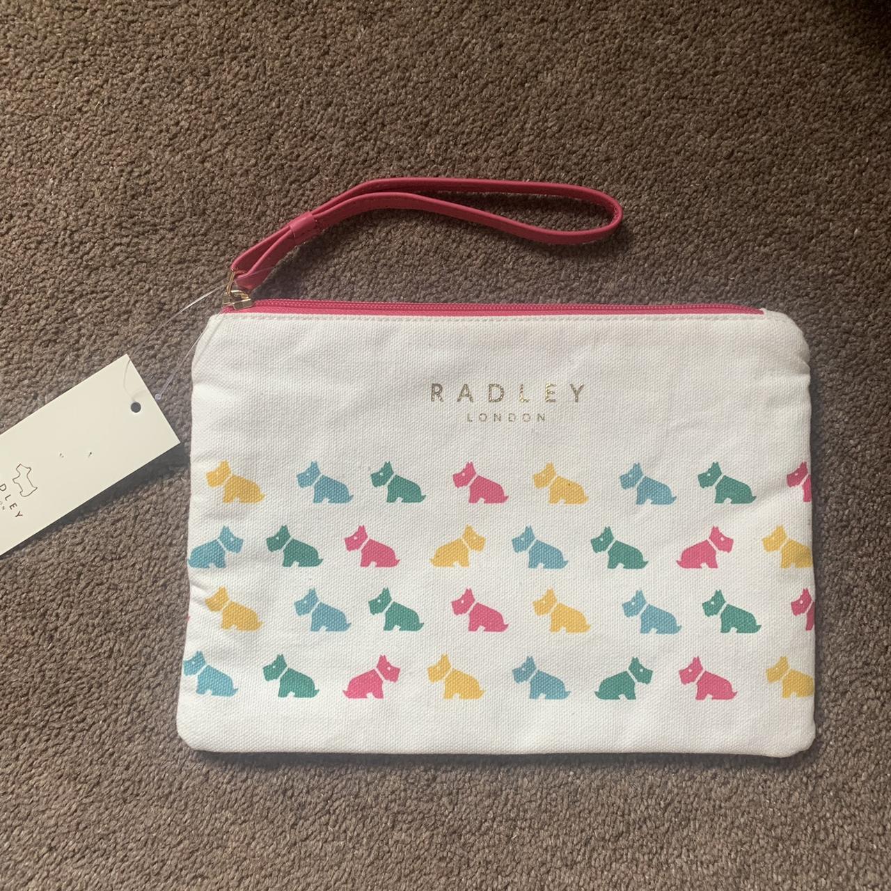 Radley London cream pouch with zip closure and pink... - Depop