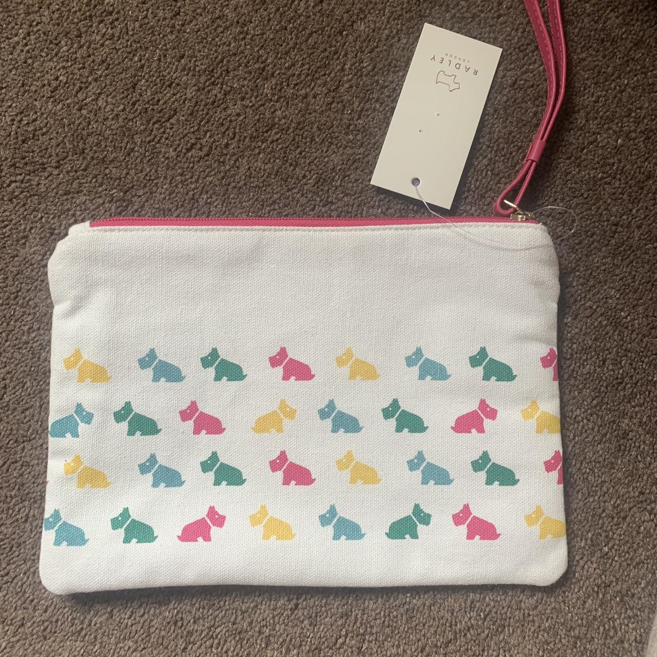 Radley London cream pouch with zip closure and pink... - Depop