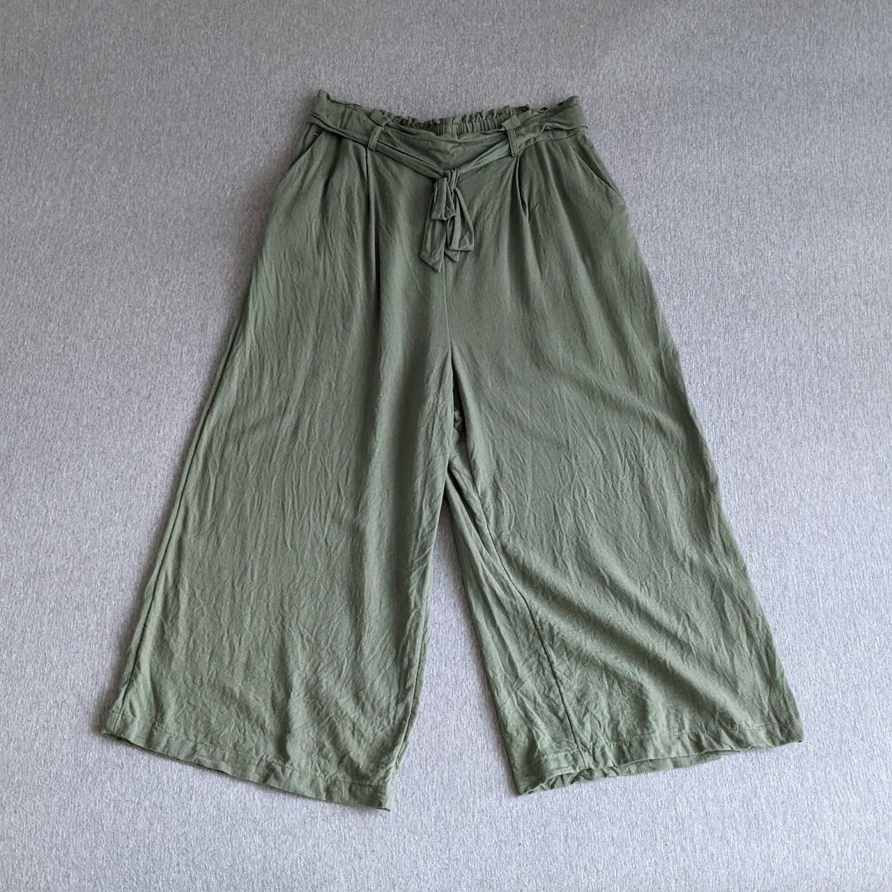 Green flowy pants from Dotti. Slightly worn in the... - Depop