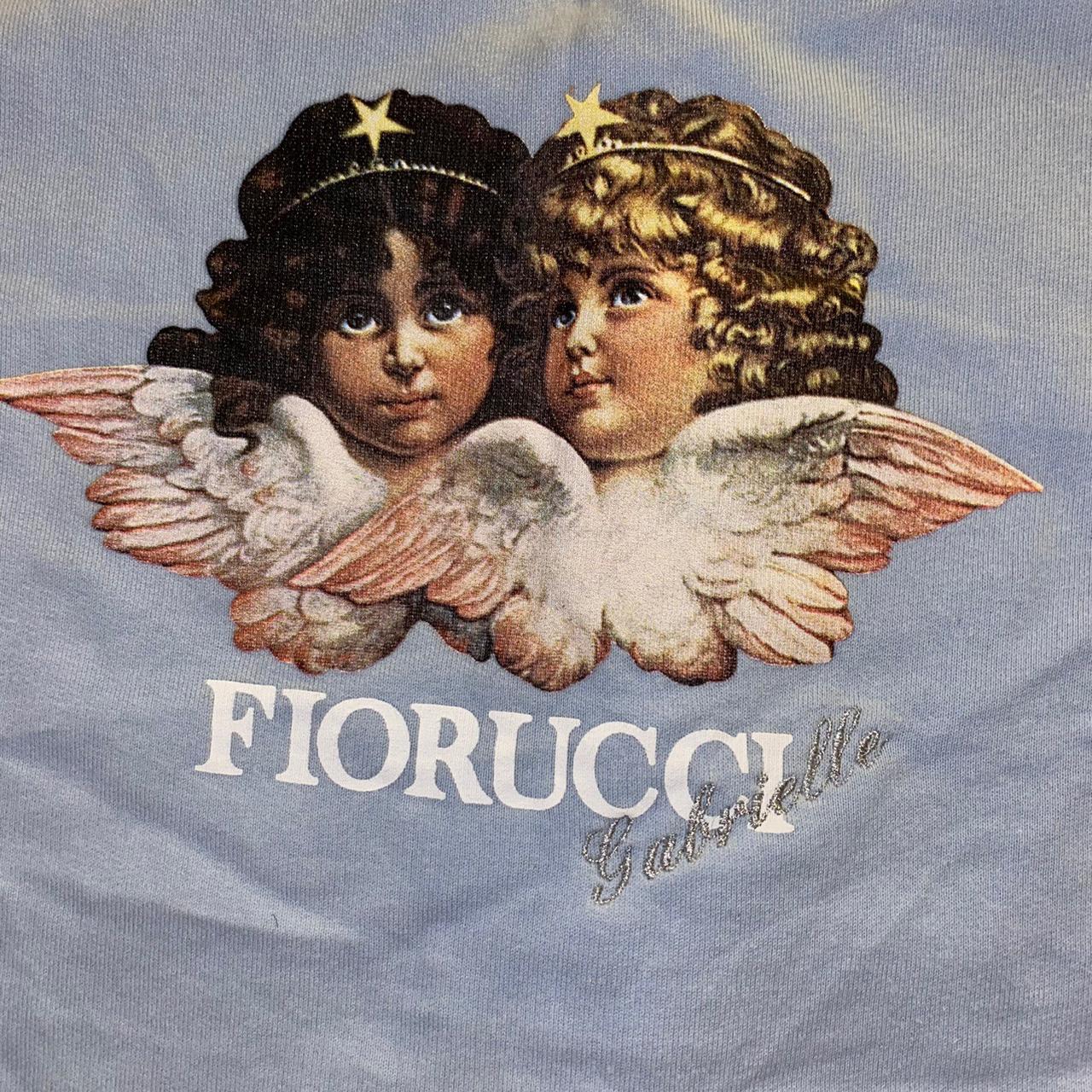 🦋🌸Fiorucci cropped jumper. Light blue with angel... - Depop
