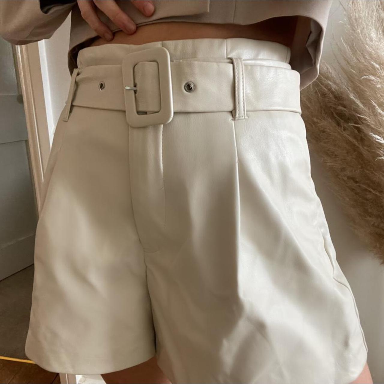 Cream faux leather high waisted shorts that can be... - Depop