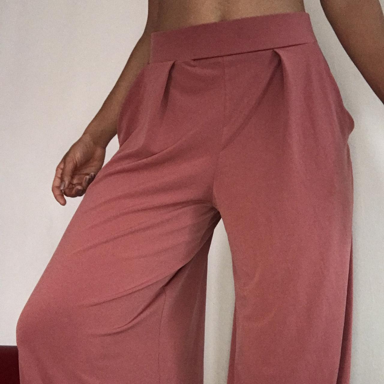 Express pink flare pants 💕 #flarepants #sexy #pink... - Depop