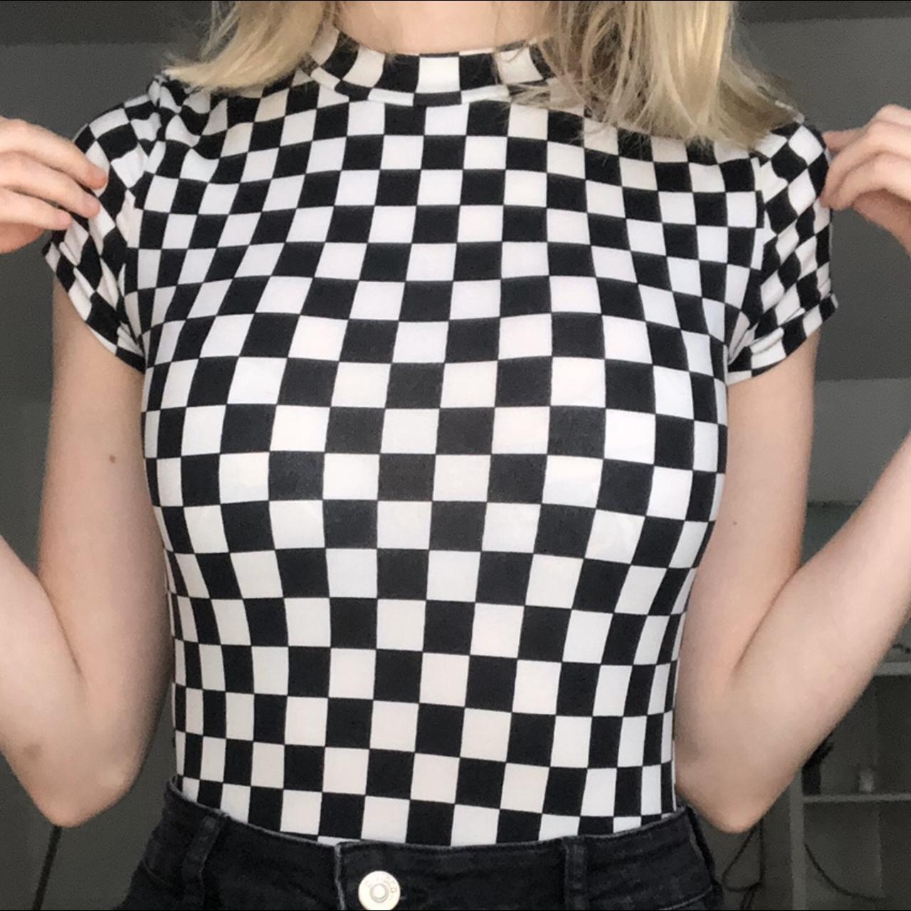 This checkered body suit fits absolutely perfect! It... - Depop
