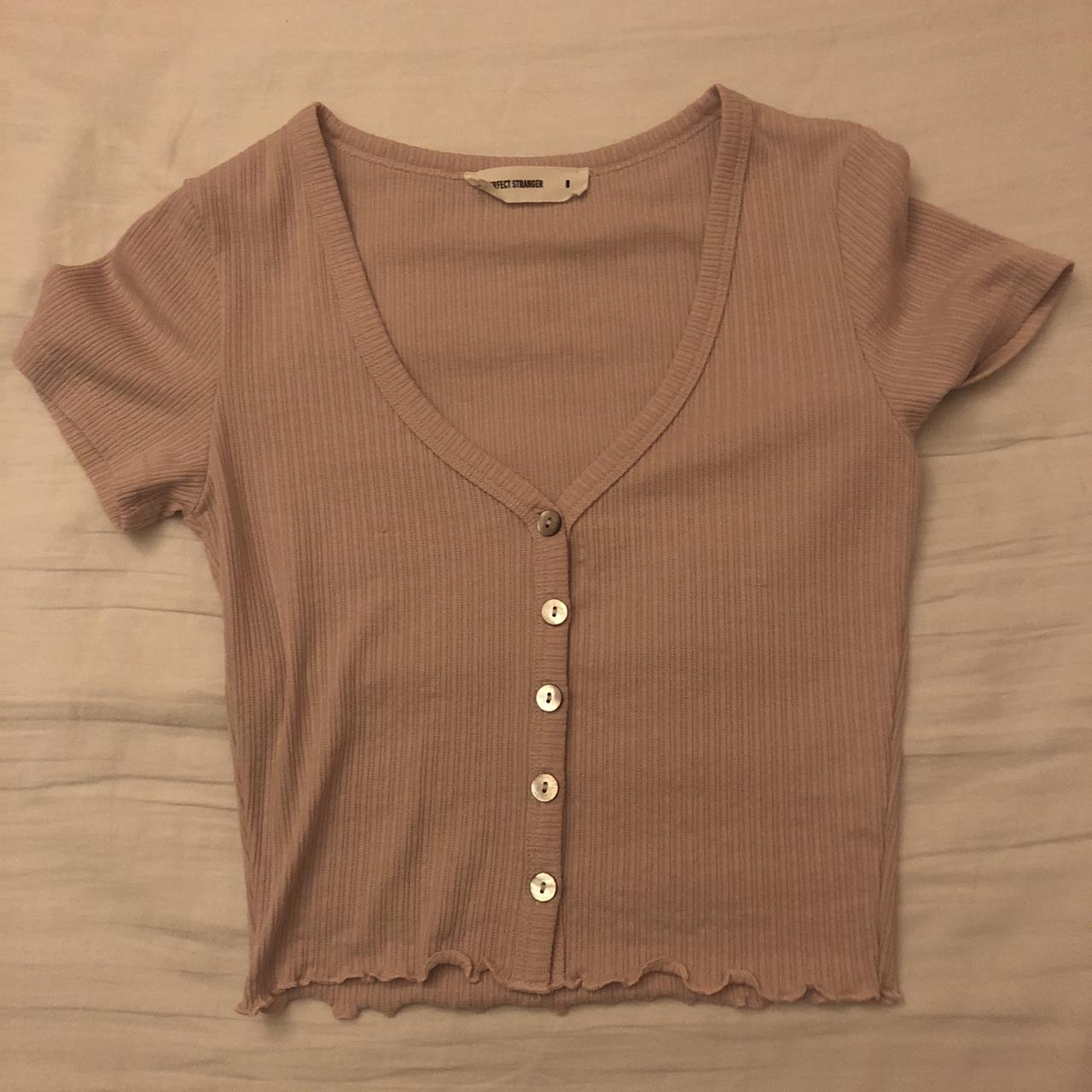 Light pink button up top from universal store - Depop