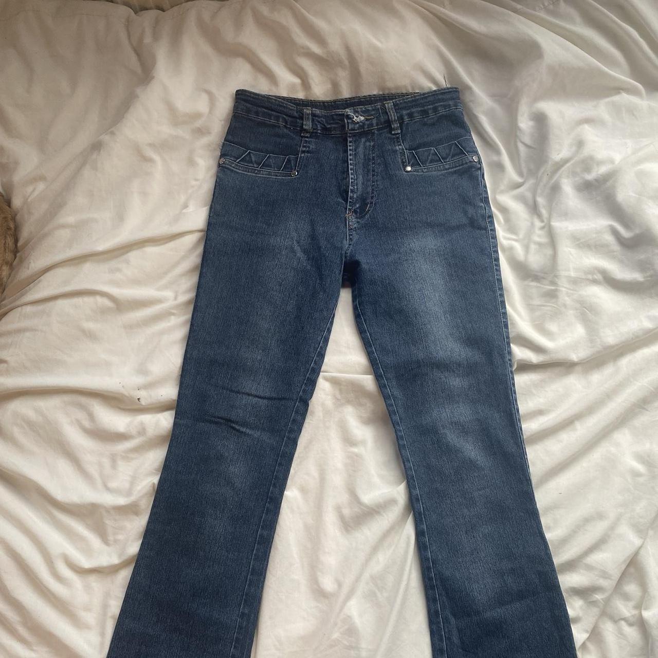 Blue bootcut flared jeans with detailing on back... - Depop