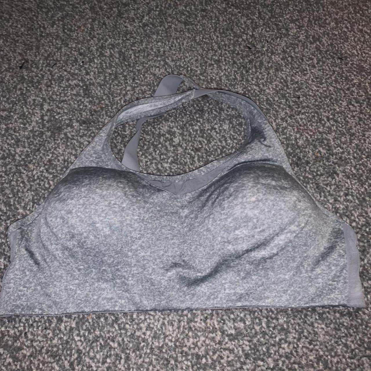 Grey sports bra with adjustable straps. Never been... - Depop