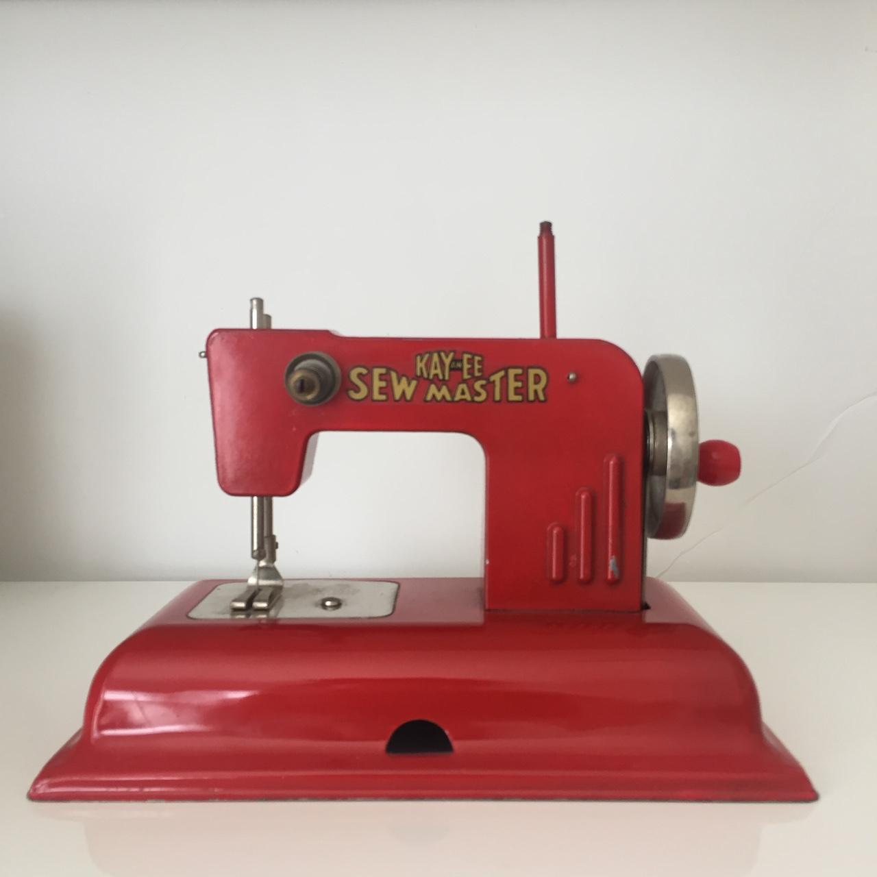 Vintage red metal toy sewing machine for decorative... - Depop