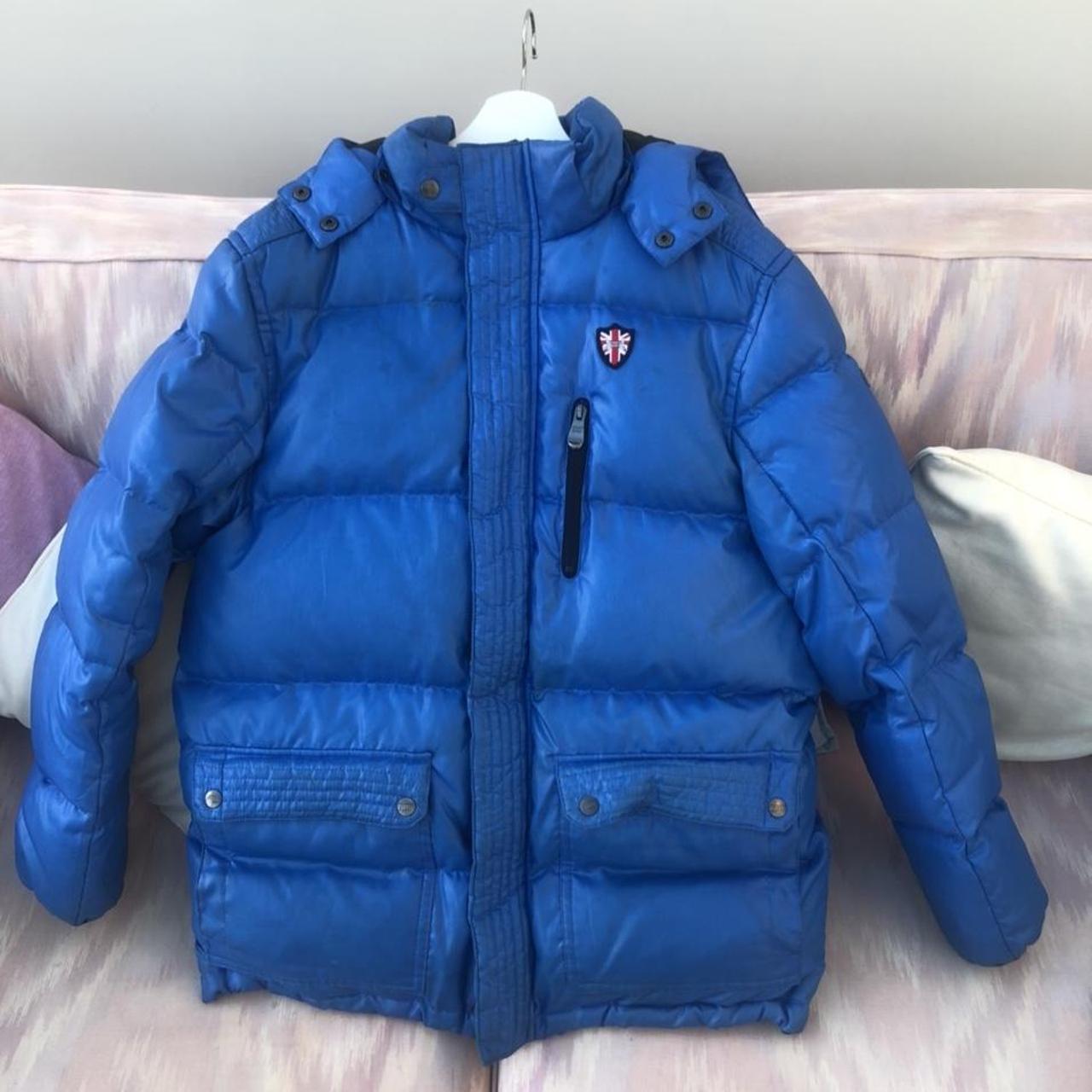 Vintage Puffa jacket with down feather filling in... - Depop