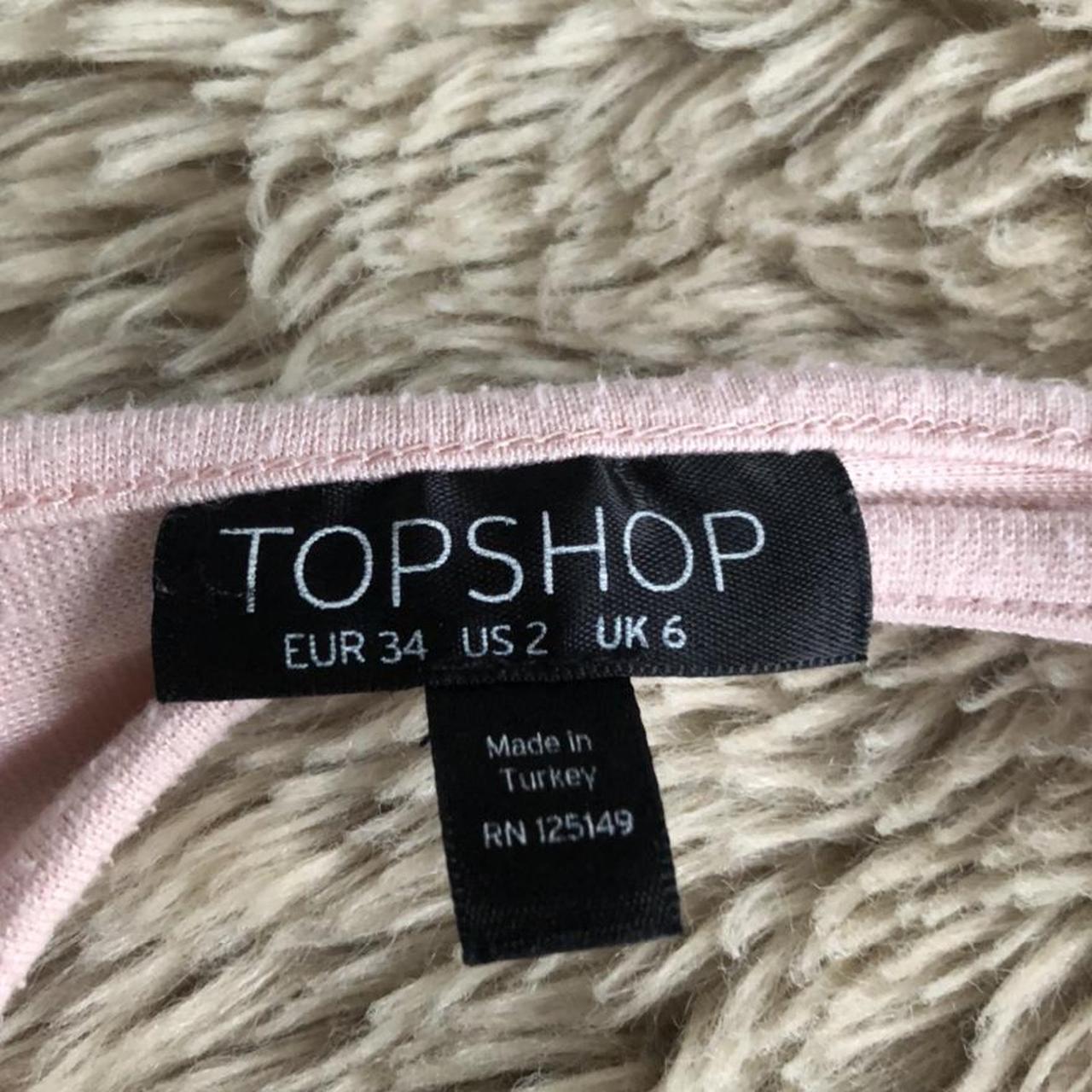 Topshop baby pink tie up bodysuit Slightly bobbled... - Depop