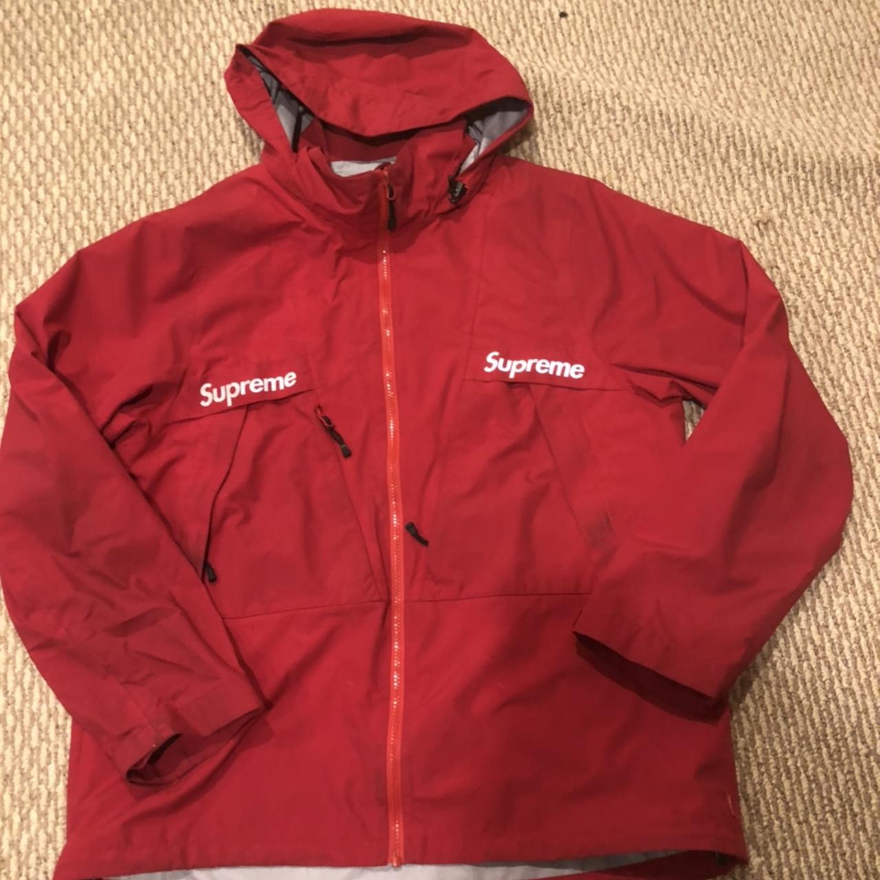 Red Supreme windbreaker with 3M accents - Depop