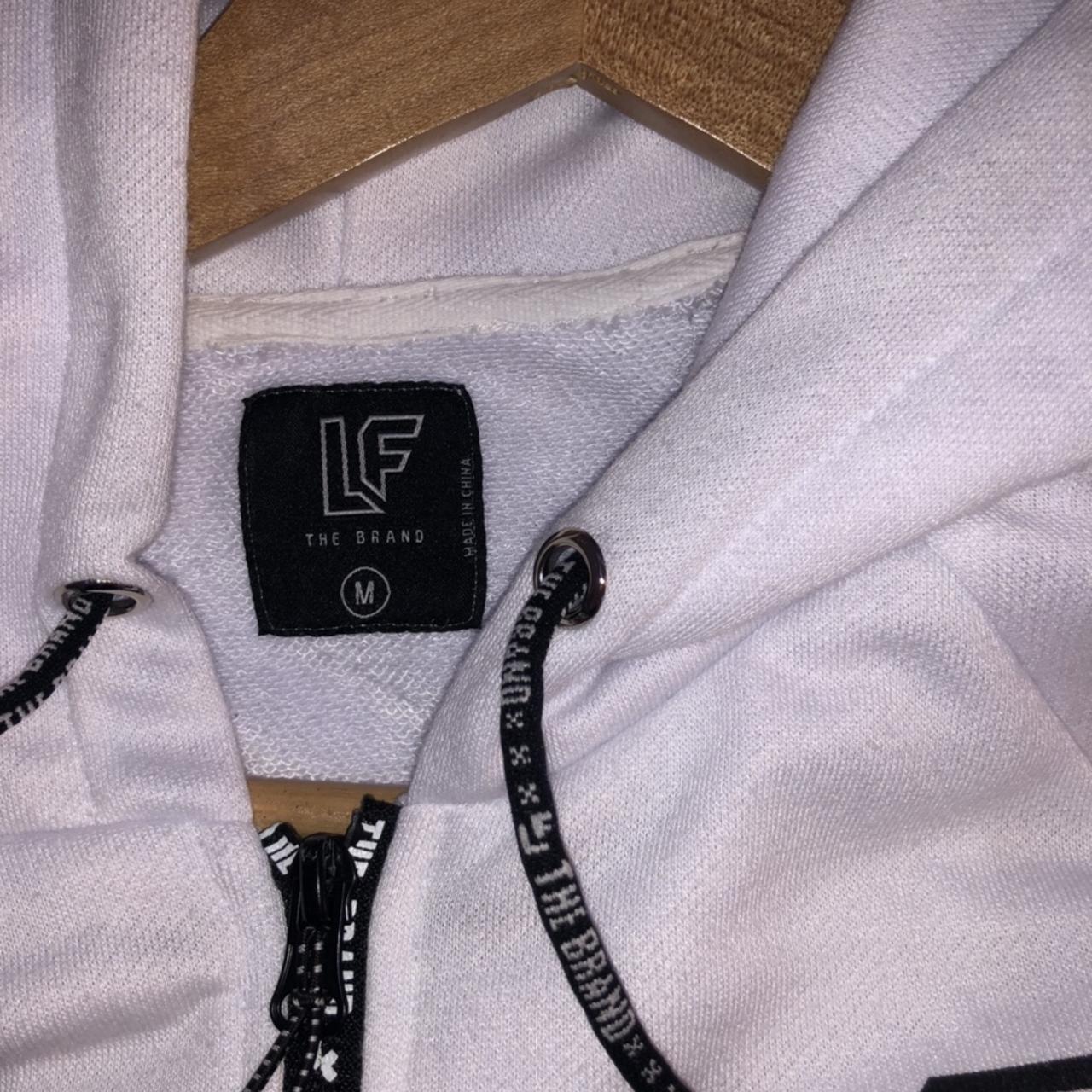 Lf white cropped zip up. No rips, holes, or stains - Depop