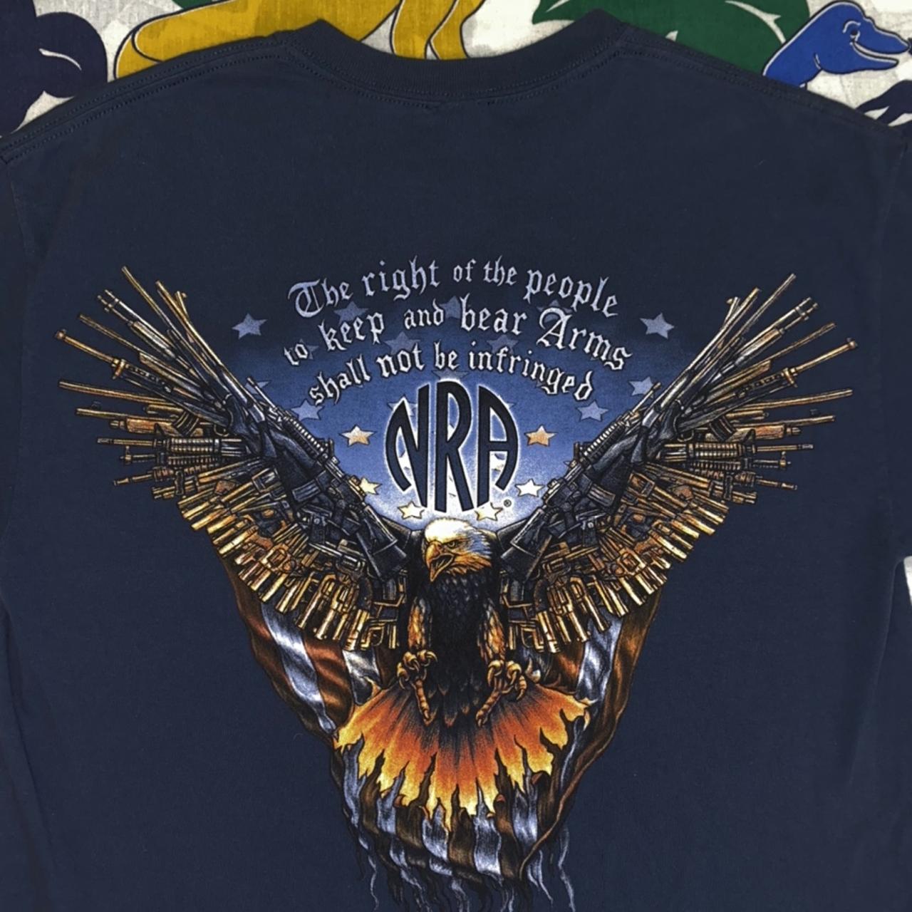 Vintage blue y2k NRA gun-bird shirt. Unique tee with... - Depop