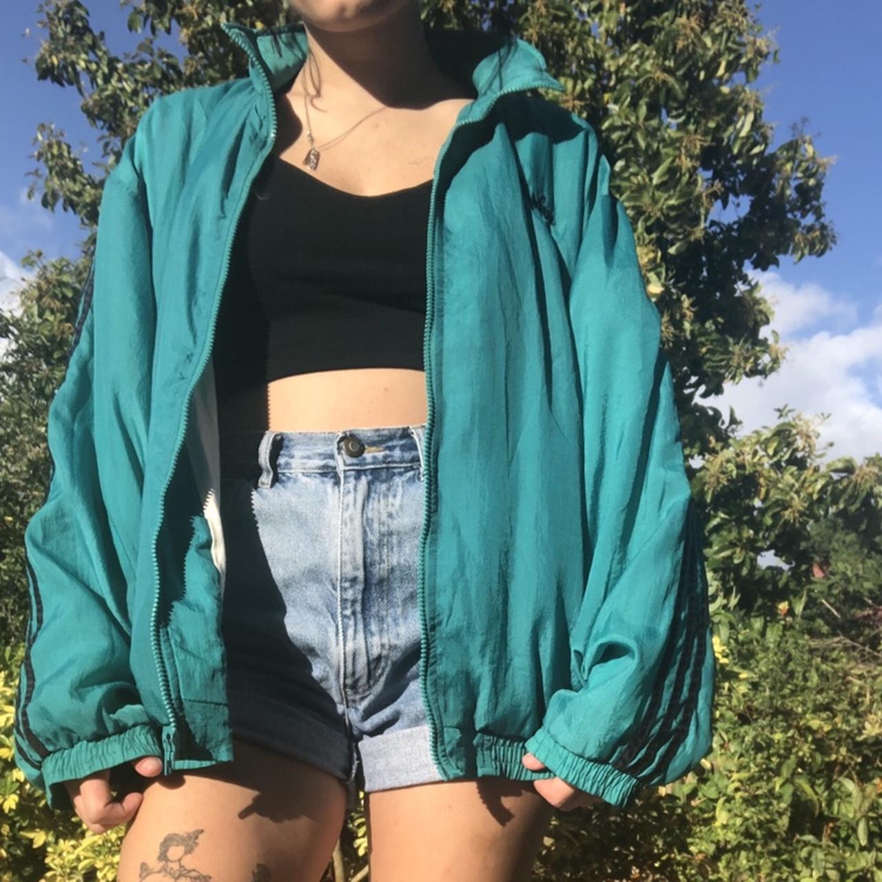 Cute little minty green windbreaker, got it at a... - Depop