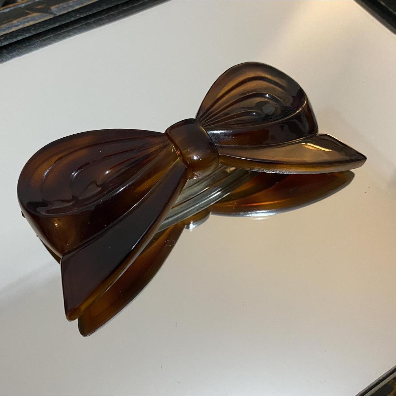 Vintage tortoise shell bow hair clip. This piece is... - Depop
