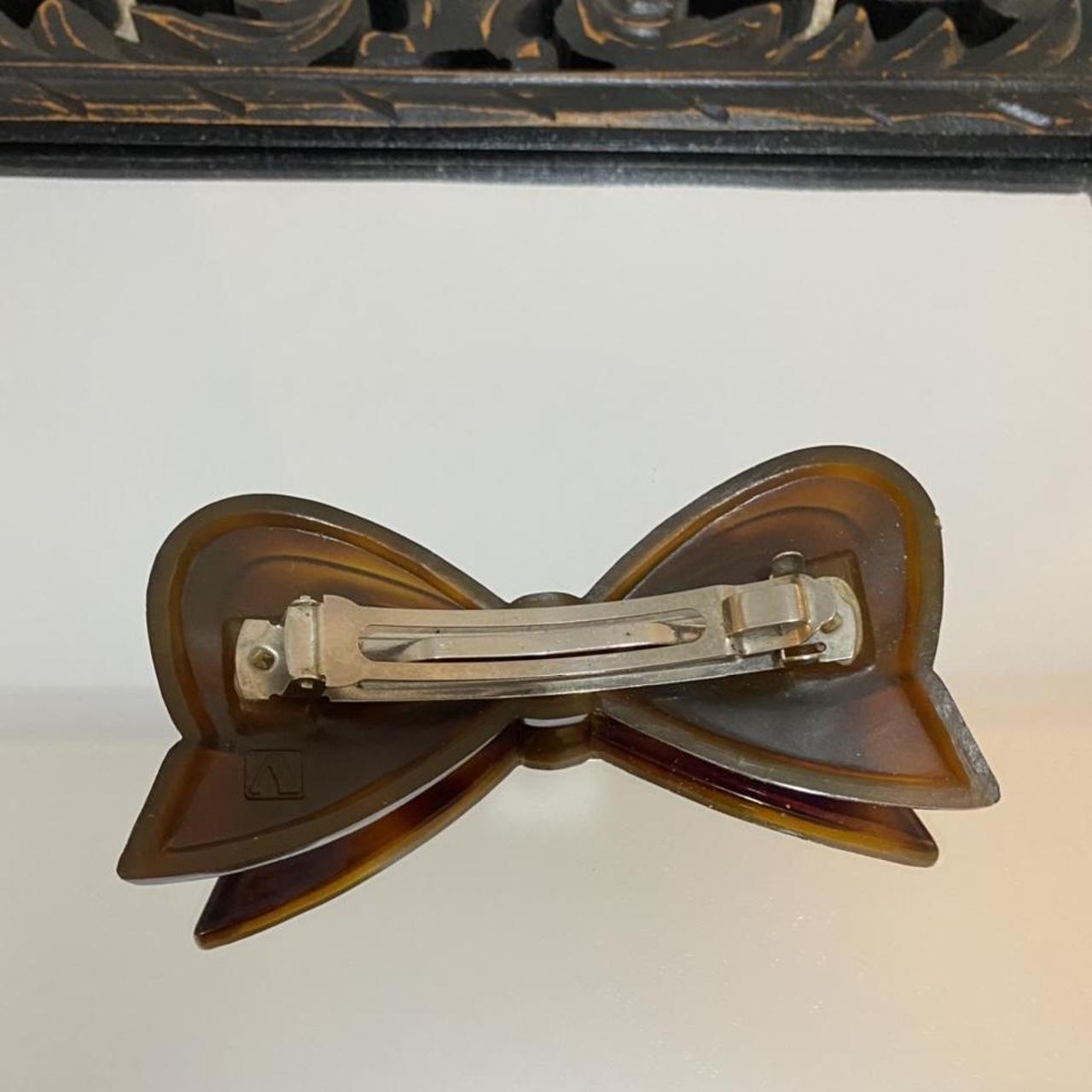 Vintage tortoise shell bow hair clip. This piece is... - Depop