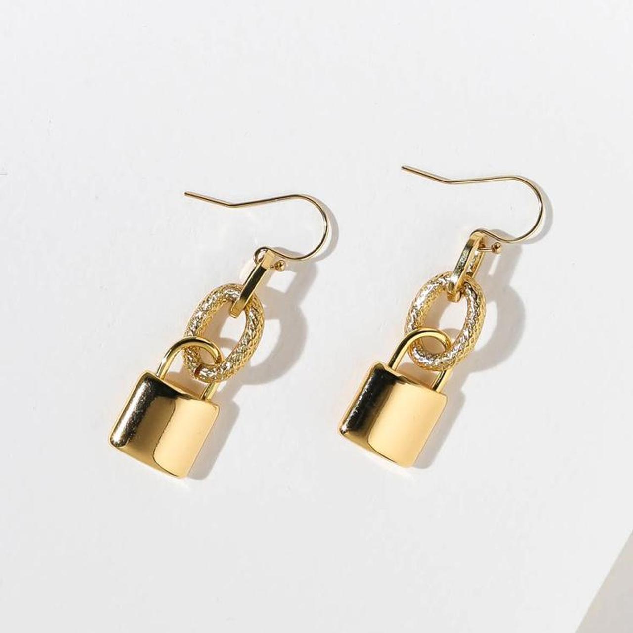 Vanessa Mooney 18K gold-plated lock earrings... - Depop
