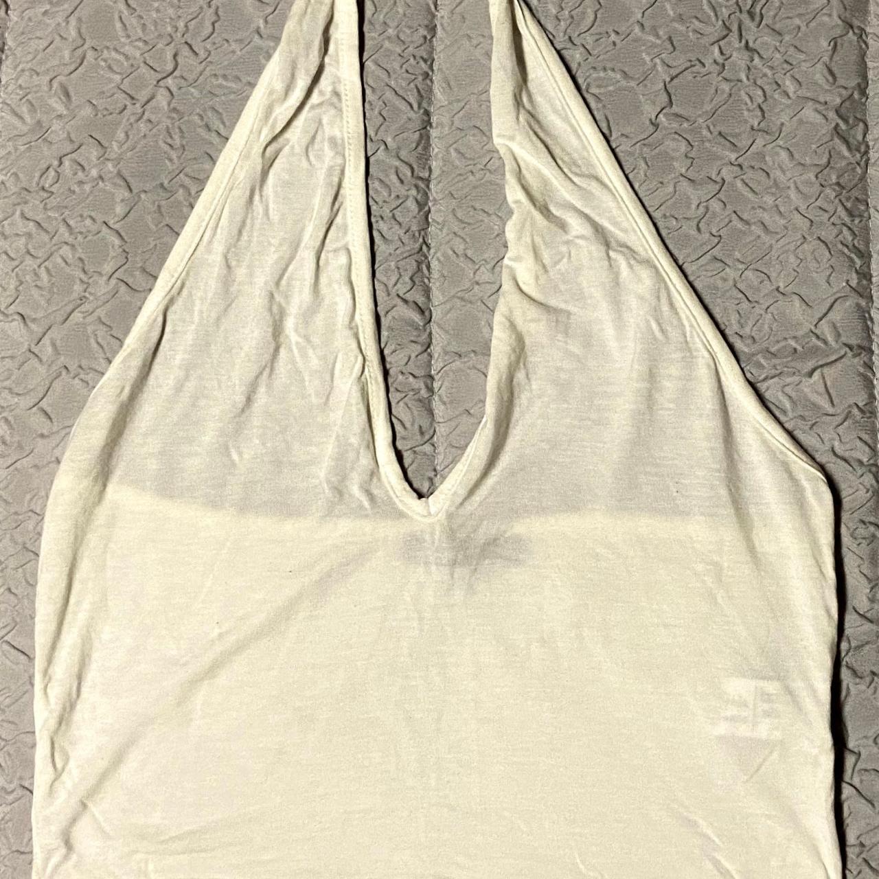 White halter tank top. Cropped right above belly... - Depop