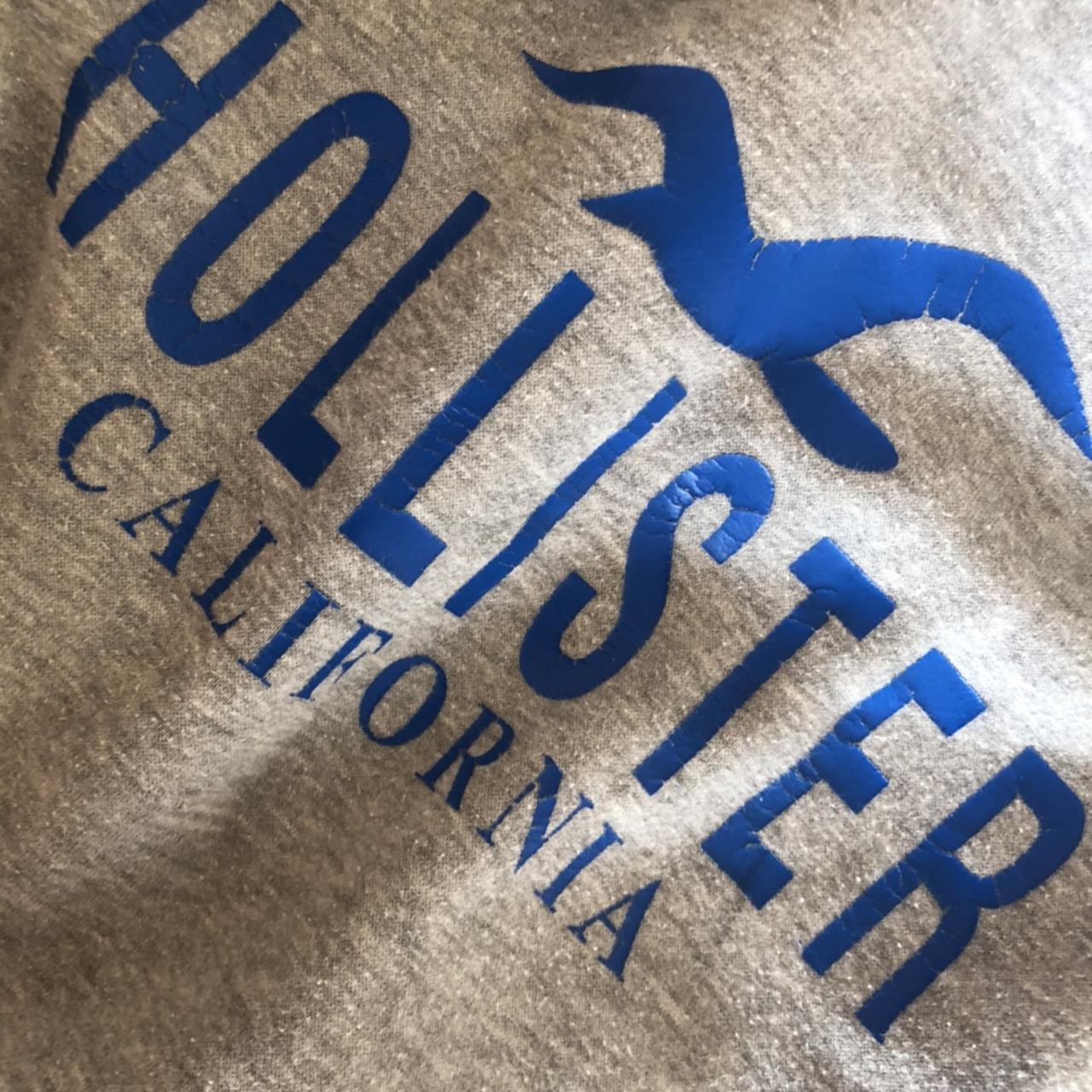 HOLLISTER grey hoodie - size label no longer visible... - Depop