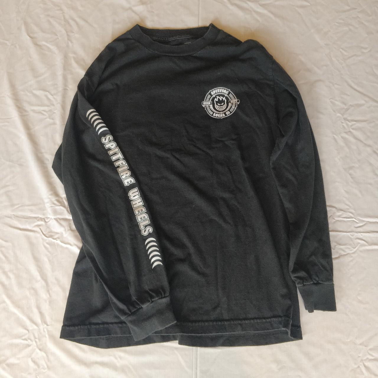Black long sleeve spitfire top with print on front,... - Depop