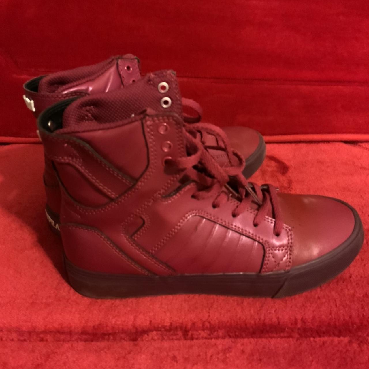 This is a Pair of pretty burgundy SUPRA kids... - Depop
