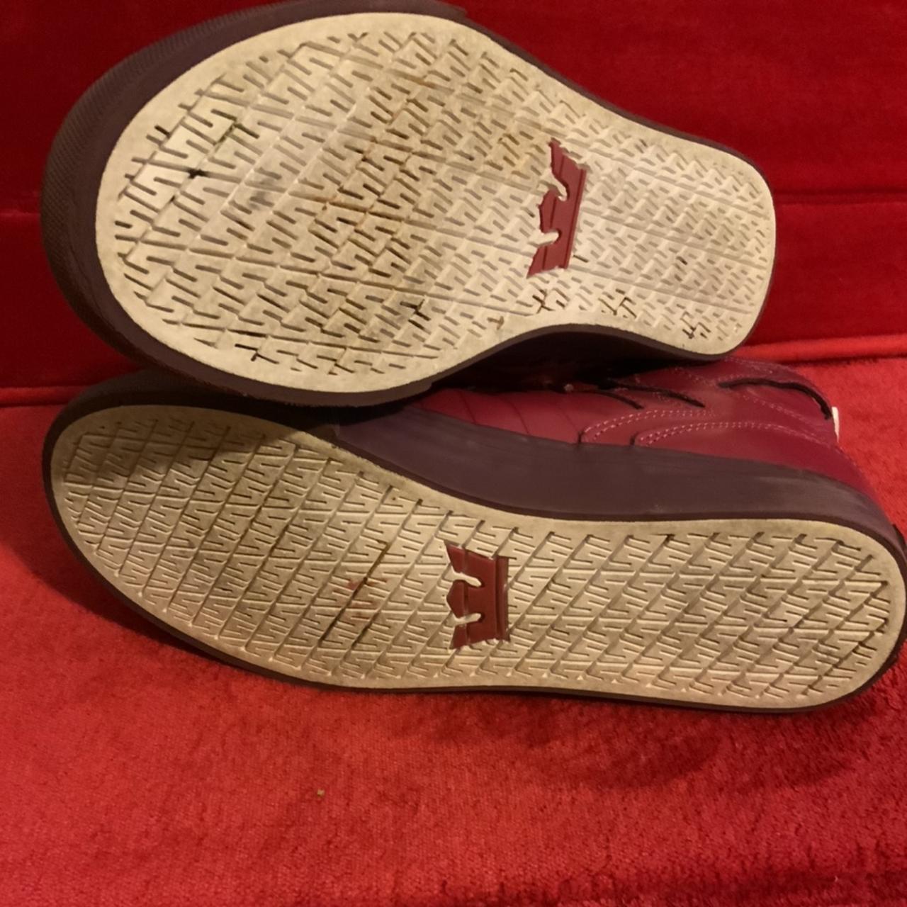 This is a Pair of pretty burgundy SUPRA kids... - Depop