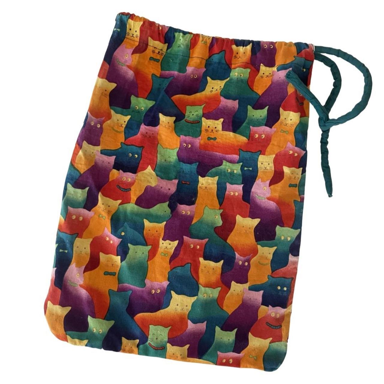 Handmade Fabric Drawstring Bag featuring a colorful... - Depop