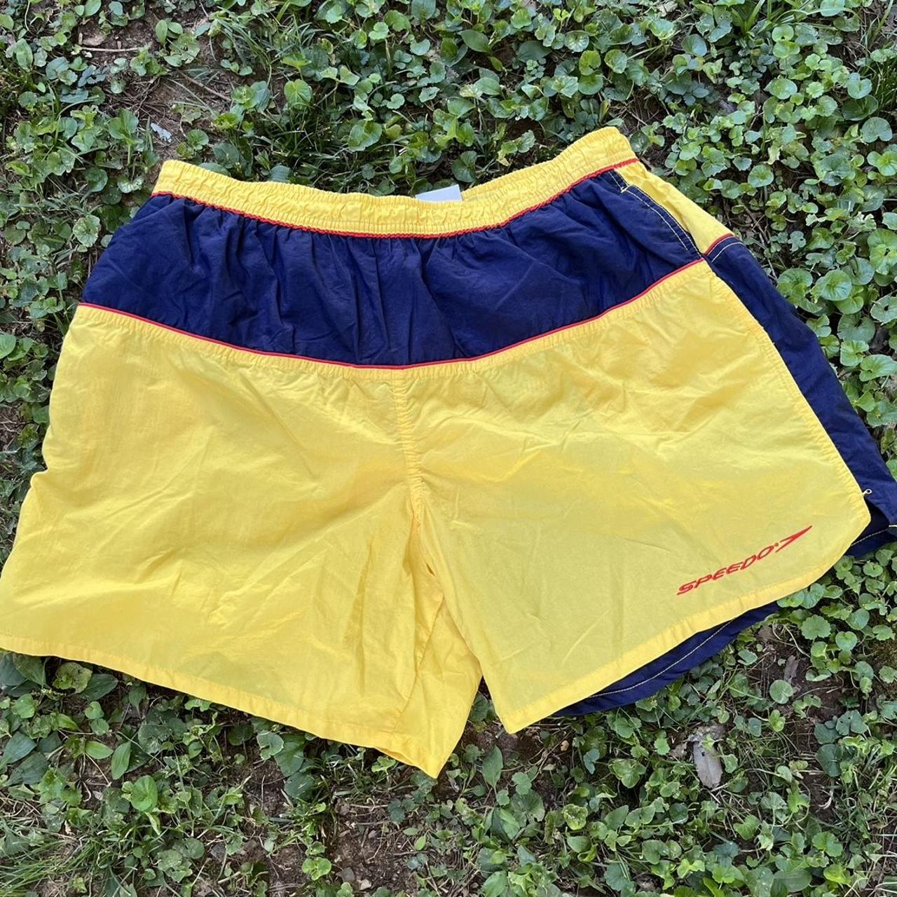 Vintage navy and yellow colorblock mens Speedo... - Depop