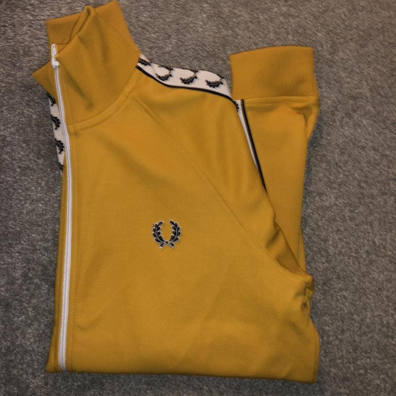Mens yellow Fred Perry zip up jacket. Size medium.... - Depop
