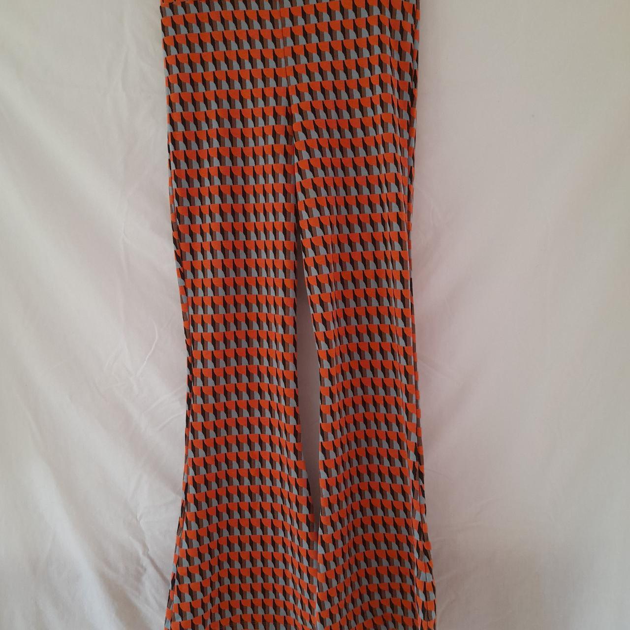 Retro style flared trousers, orange and blue funky... - Depop