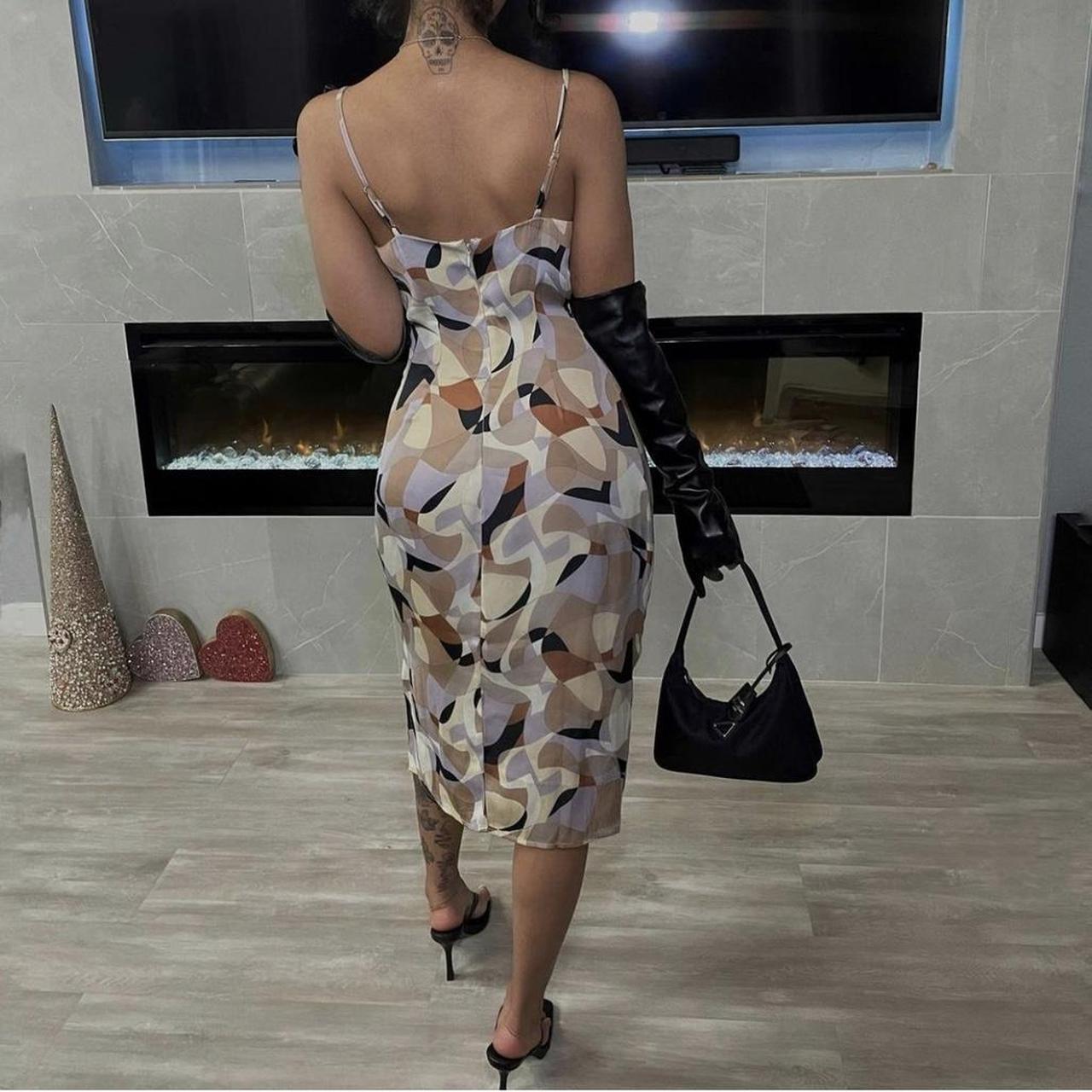 Pucci inspired dress worn once! It has a cute spilt... - Depop