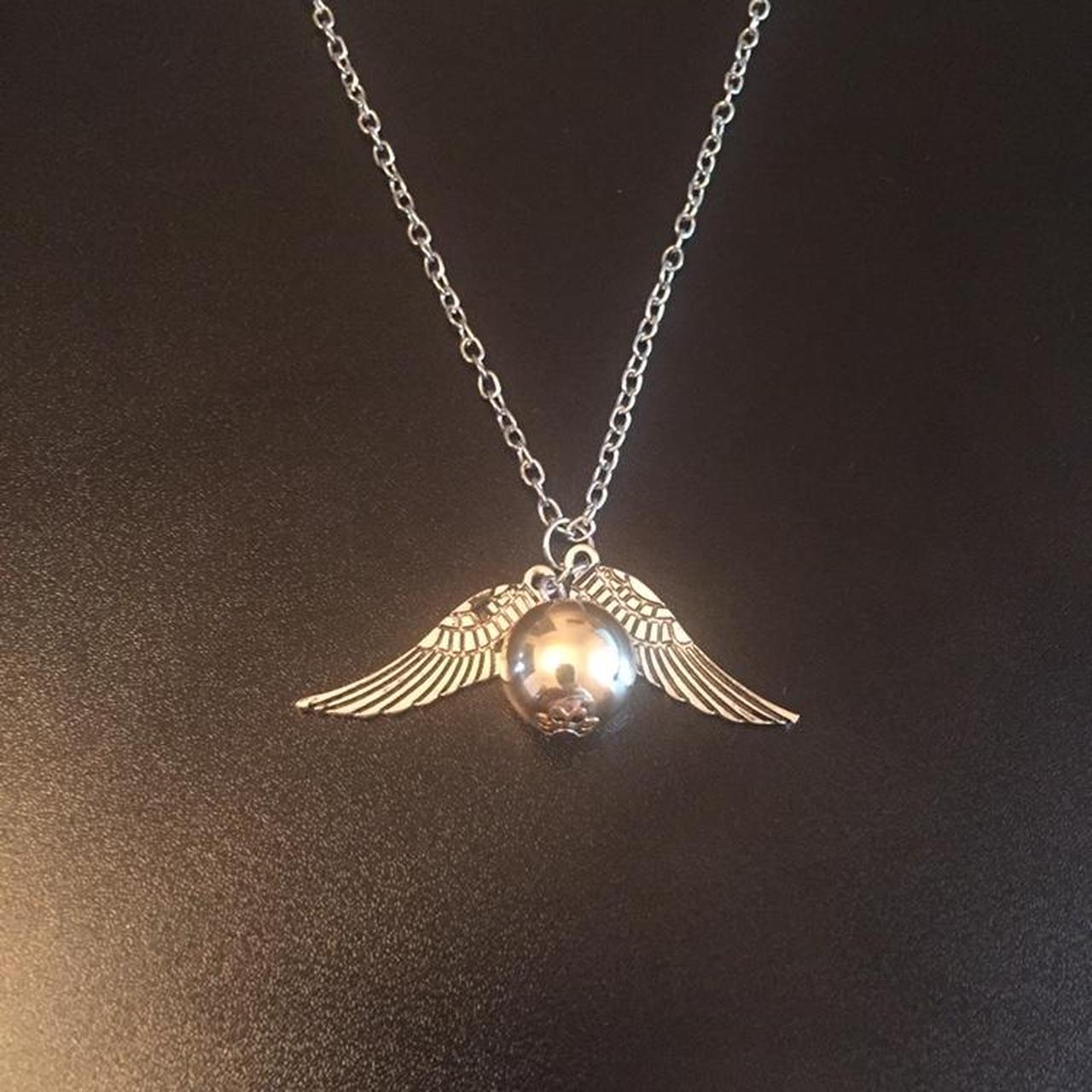 Silver chain snitch angel wing Harry Potter... - Depop