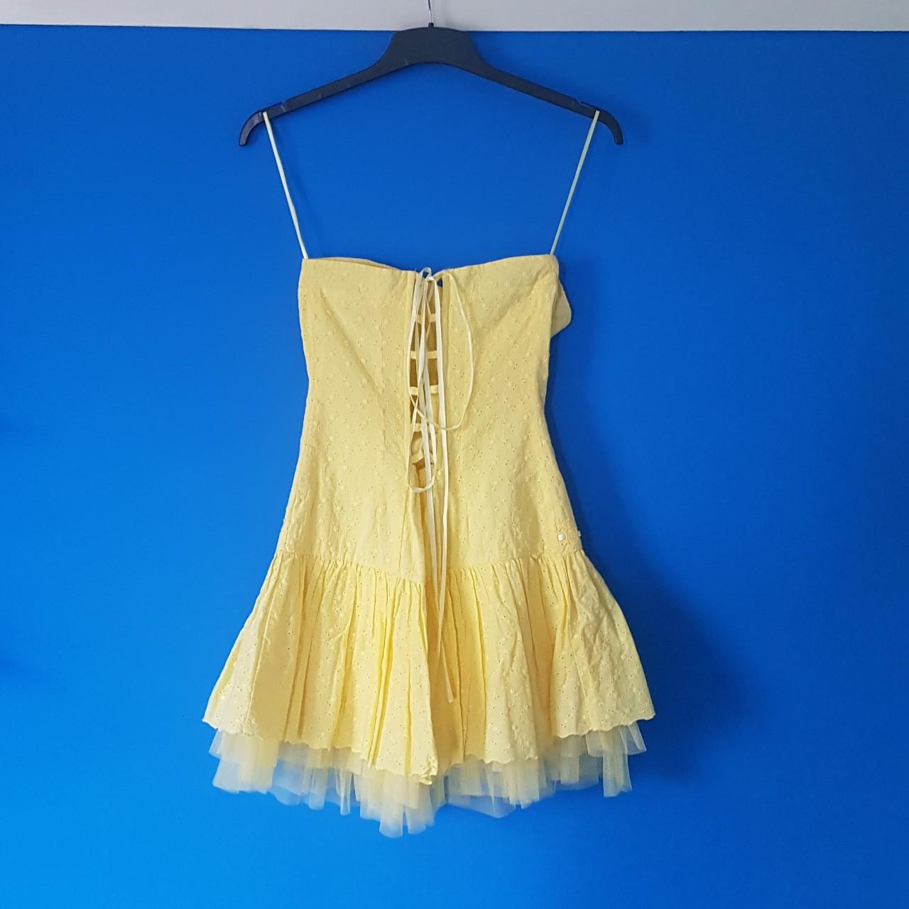 Miss Posh lemon yellow drop waist dress with ruffle... - Depop