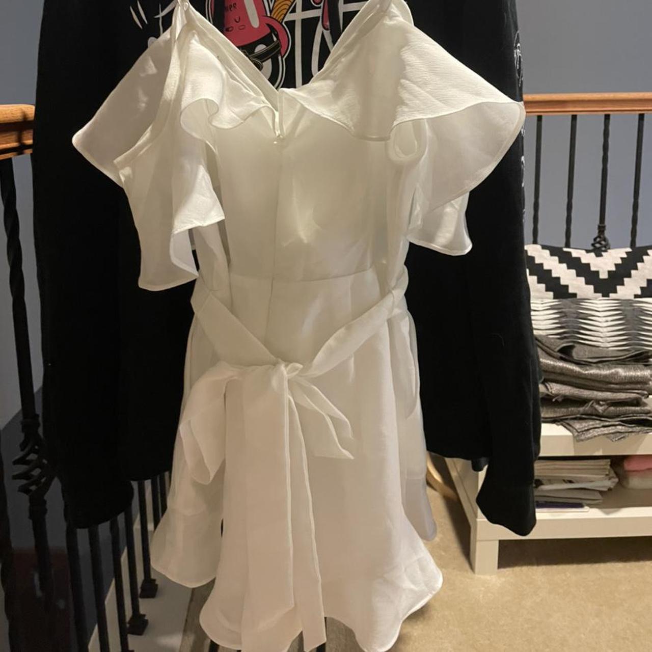 Beautiful white flowy romper. Tagged for... - Depop