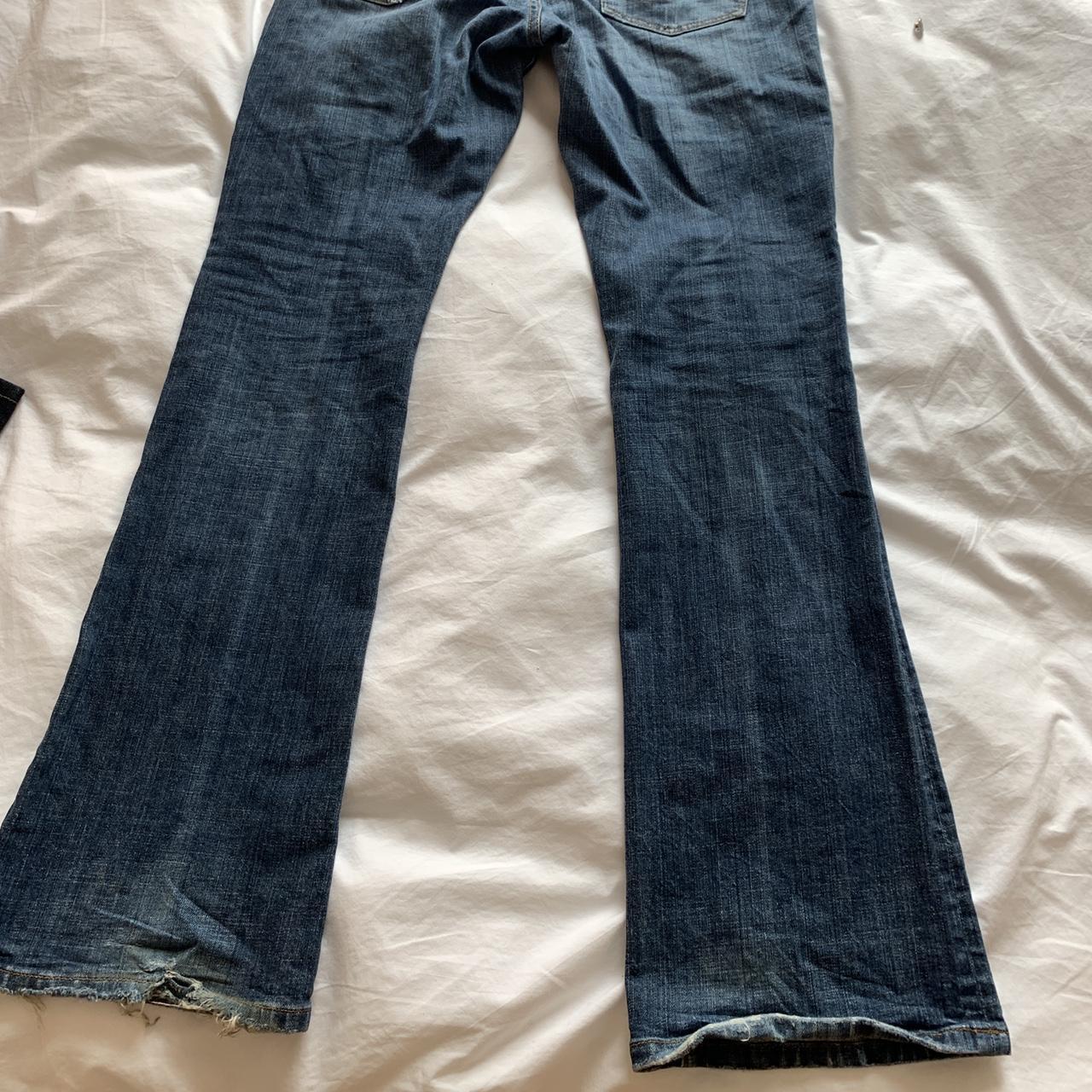 Low waisted vintage flared distressed jeans 10/12... - Depop