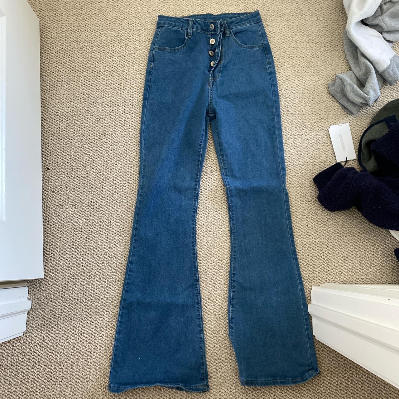 Adorable button up flare jeans. Worn once! So comfy... - Depop