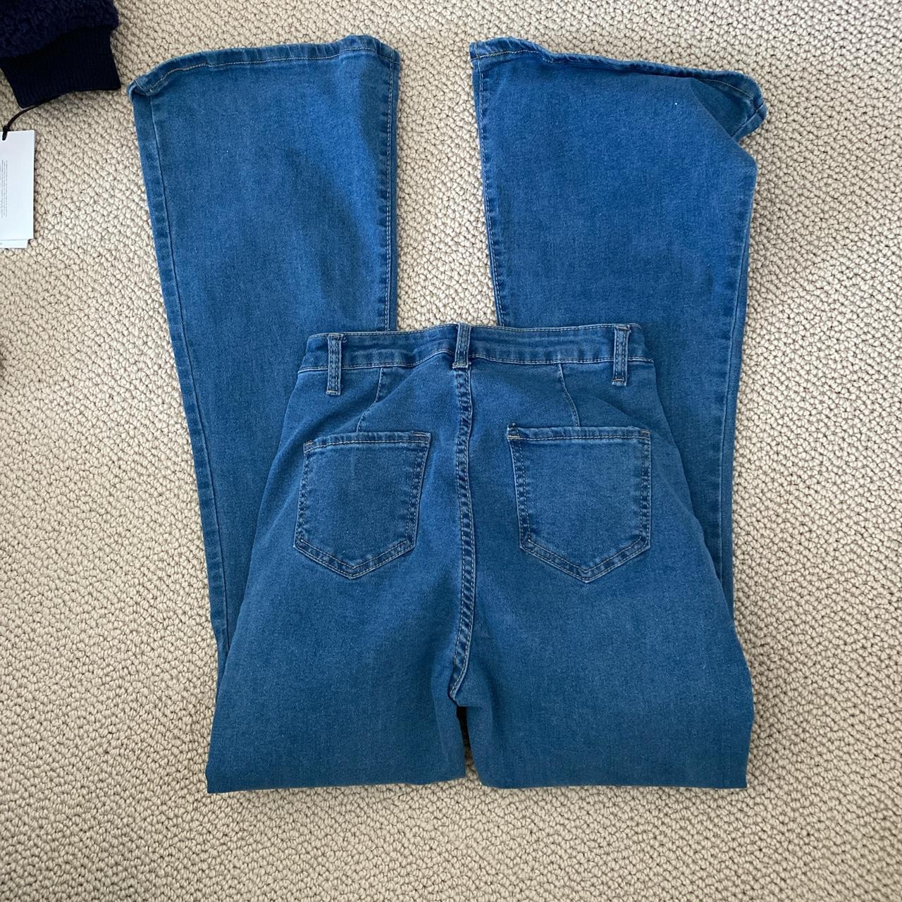 Adorable button up flare jeans. Worn once! So comfy... - Depop