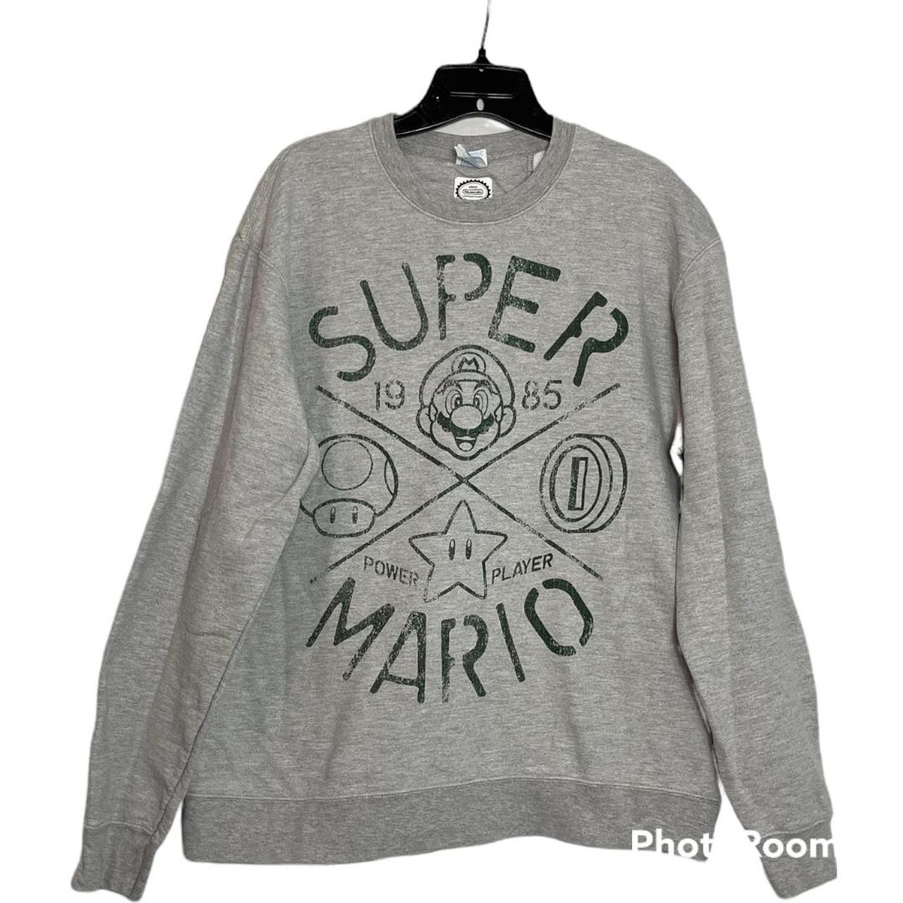 Nintendo Grey Super Mario Vintage Crest 1985... - Depop