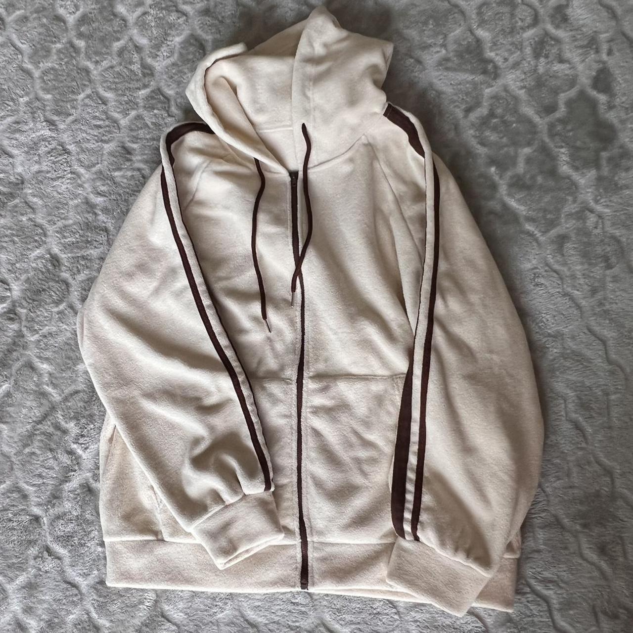 Cream fleece zip up hoodie with brown stripes... - Depop